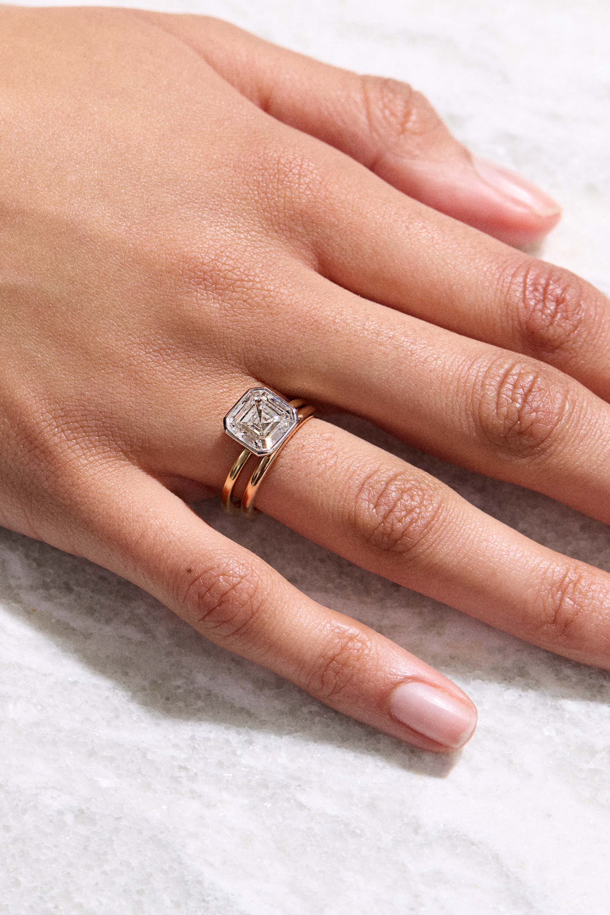 MILESTONE SIGNATURE BEZEL ASSCHER DIAMOND RING – AURUM + GREY