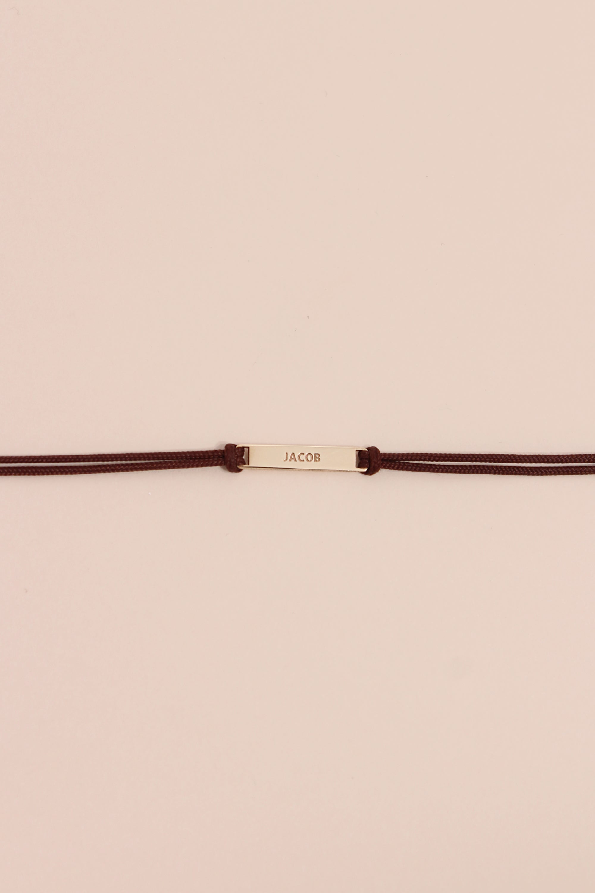 THE LOVE TAG CORD BRACELET – AURUM + GREY