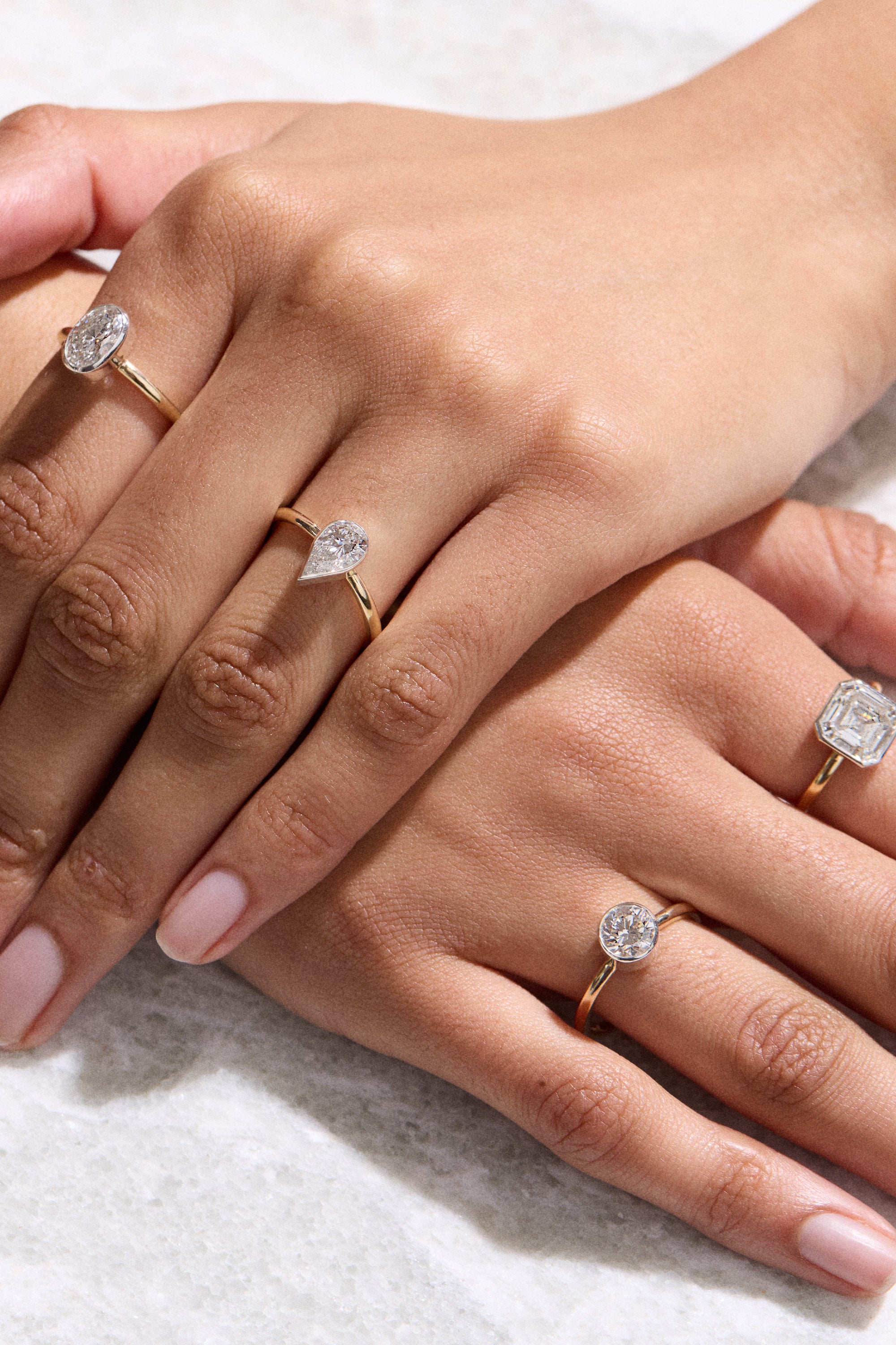 MILESTONE SIGNATURE BEZEL OVAL DIAMOND RING – AURUM + GREY