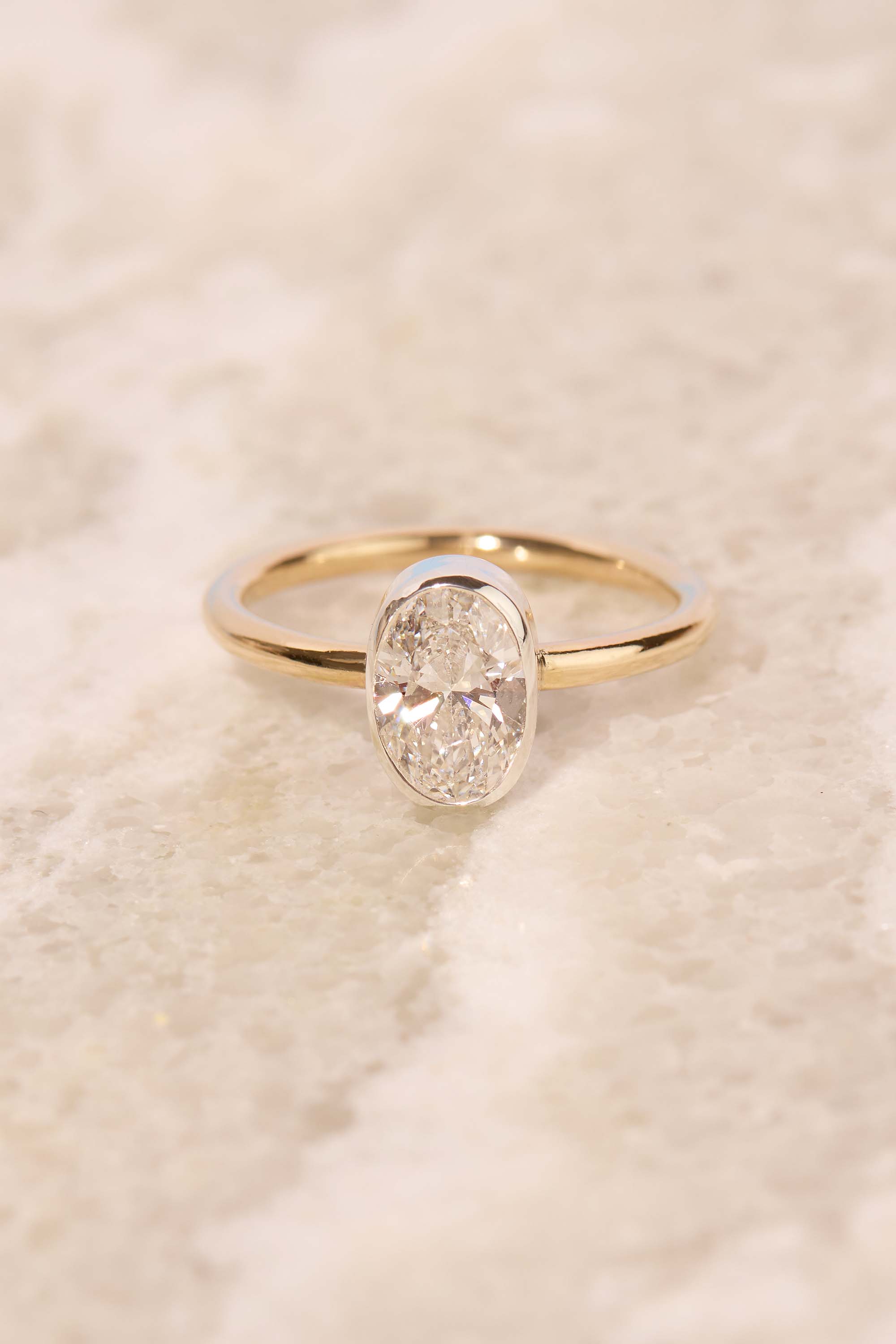 MILESTONE SIGNATURE BEZEL OVAL DIAMOND RING – AURUM + GREY